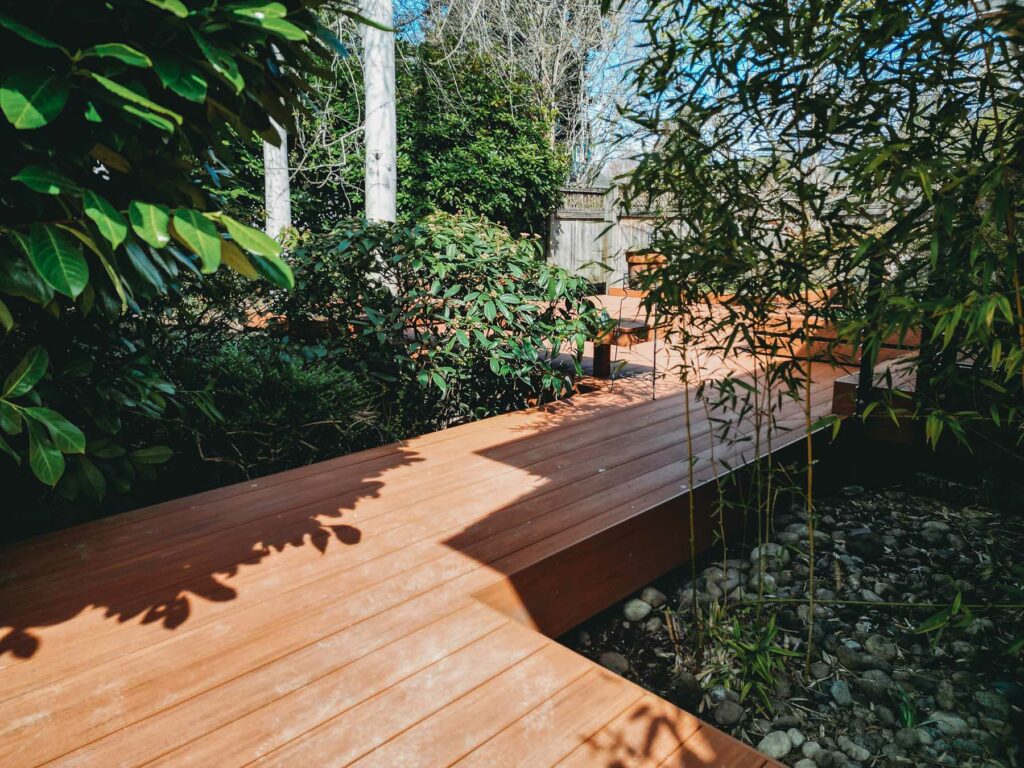 Bright natural wood color composite decking, elevated trail, and built ...