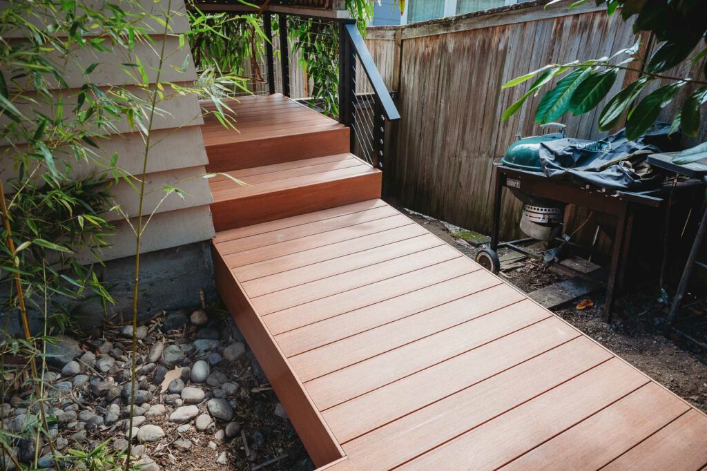 Bright natural wood color composite decking, elevated trail, and built ...